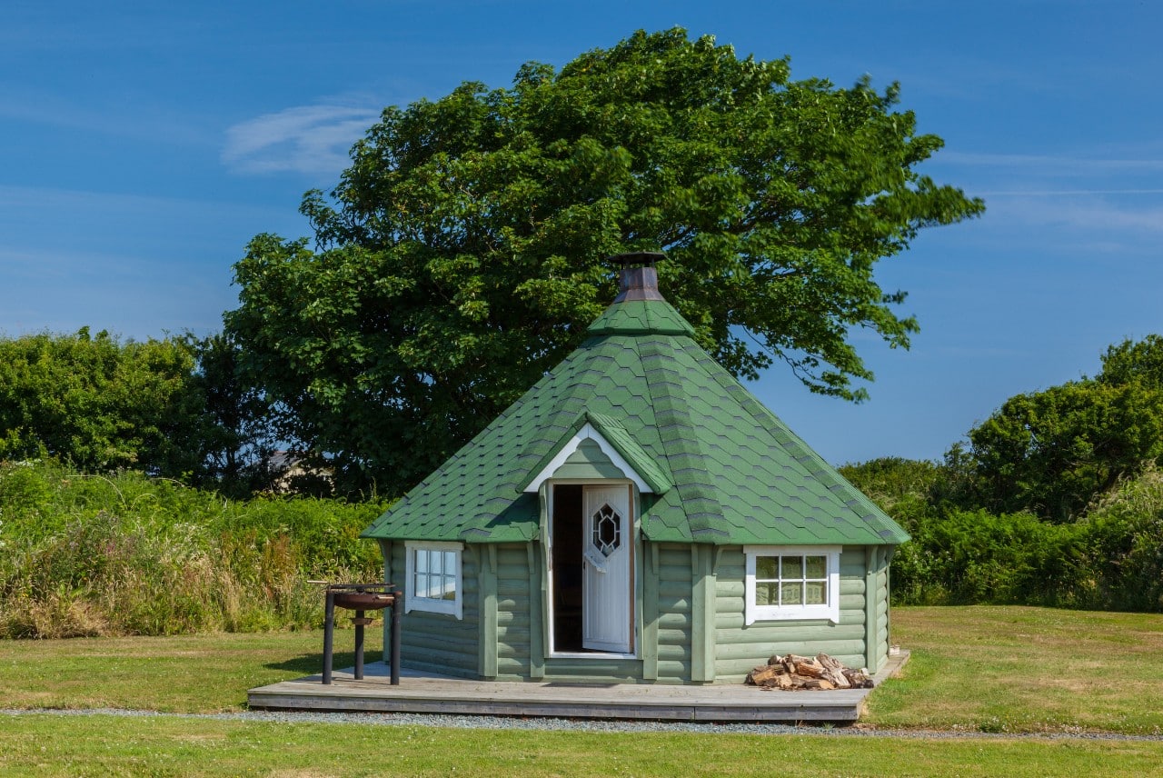 Glamping in Devon with hot Tub in a cabin at Coastal Cabins