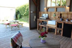 Glamping Wales at Treberfedd Farm in Dora The Edwardian Caravan